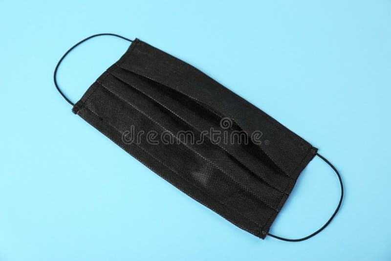 Homemade Protective Face Mask on Light Blue Background Stock Photo ...
