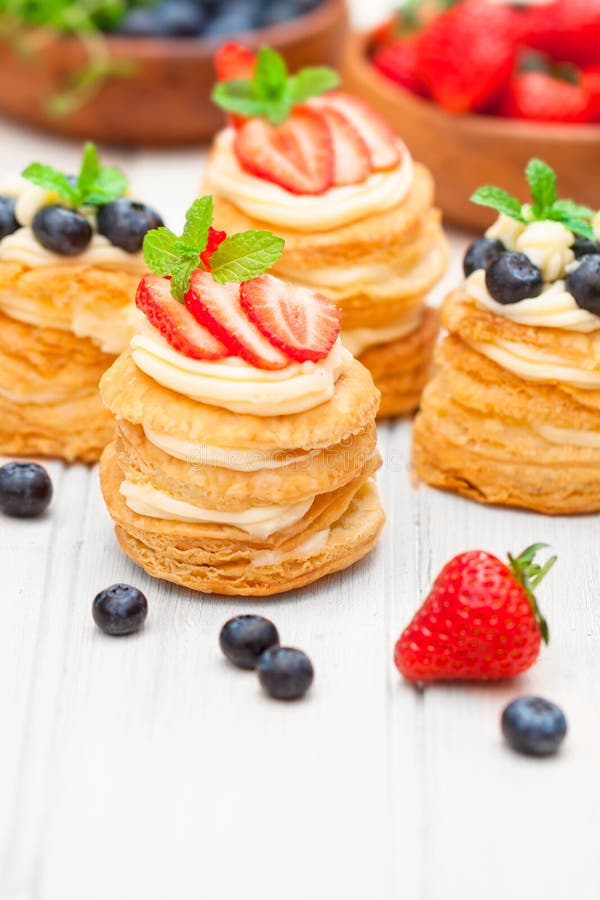 Homemade Puff Pastry Stuffed with Cream and Berries on White Tab Stock ...