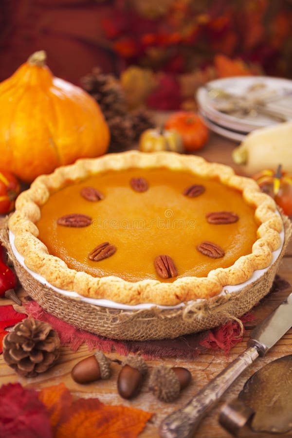 Homemade Pumpkin Pie on a Rustic Table Stock Image - Image of leaves ...