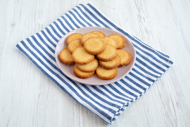 Homemade Pure Butter Shortbreads on a Pink Plate, Side View Stock Photo ...
