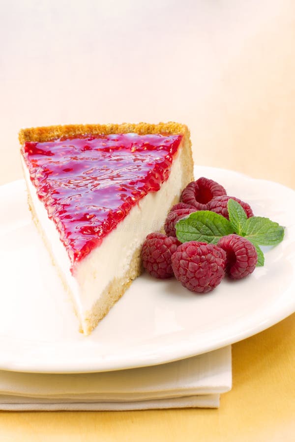 Homemade Raspberry Cheesecake Slice Stock Photo - Image of coulis ...