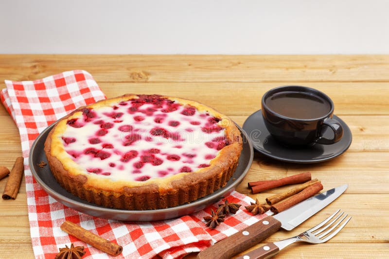 Homemade Raspberry Pie with Yogurt Filling and Cup of Tea on Wooden ...