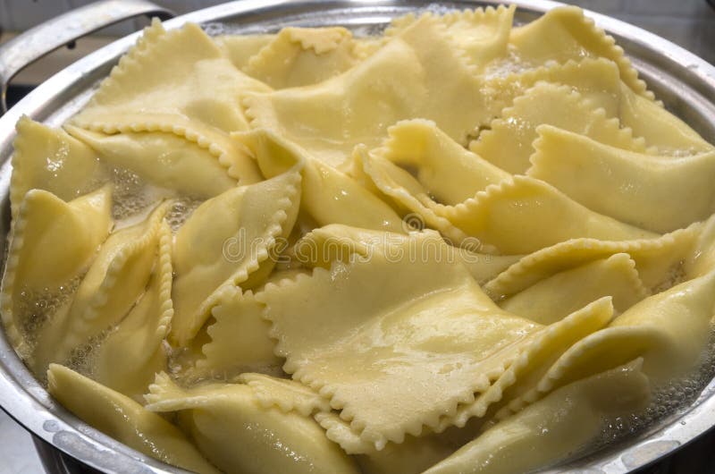 Homemade ravioli cooking stock image. Image of chees - 37282239