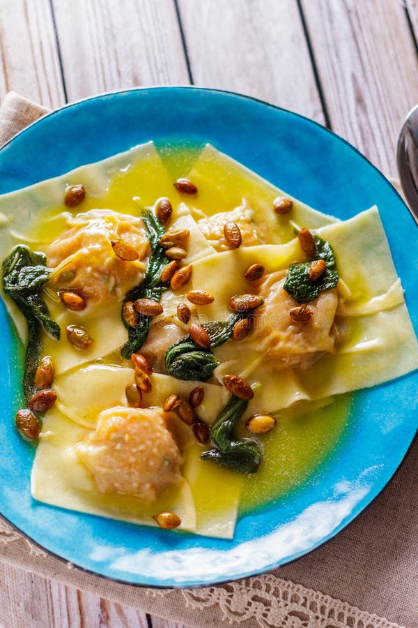 Homemade Ravioli with Pumpkin on a Blue Plate Top View Stock Image ...