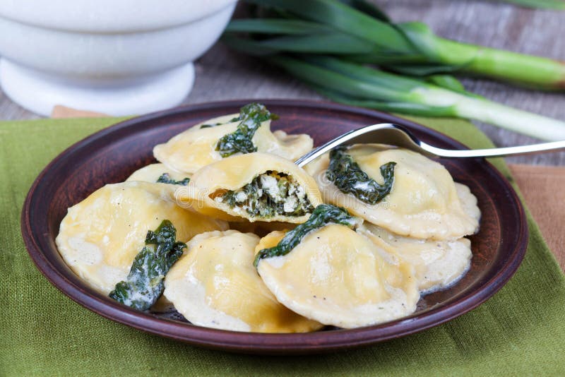 Homemade Ravioli Stuffed with Ricotta and Spinach on a Fork Stock Image ...
