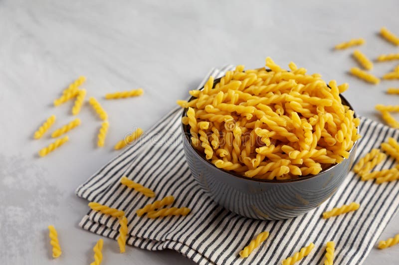 Homemade Raw Dry Gemelli Pasta in a Bowl, Side View Stock Photo - Image ...