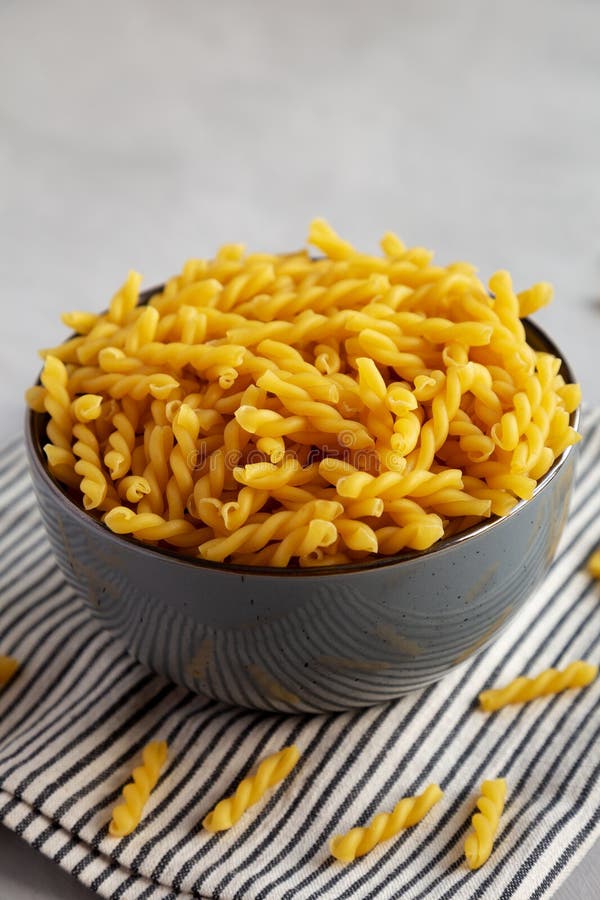 Homemade Raw Dry Gemelli Pasta in a Bowl, Side View Stock Image - Image ...