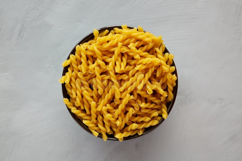Homemade Raw Dry Gemelli Pasta in a Bowl, Top View Stock Image - Image ...