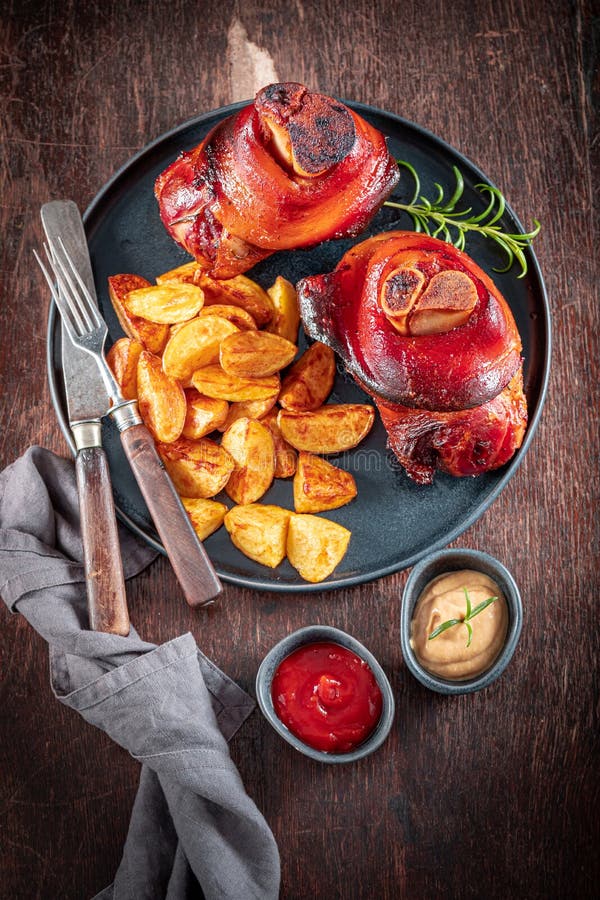 Homemade Roasted Pork Knuckle Served with Fries and Ketchup Stock Image ... Homemade Roasted Pork Knuckle Served with Fries and Ketchup Stock Image ...