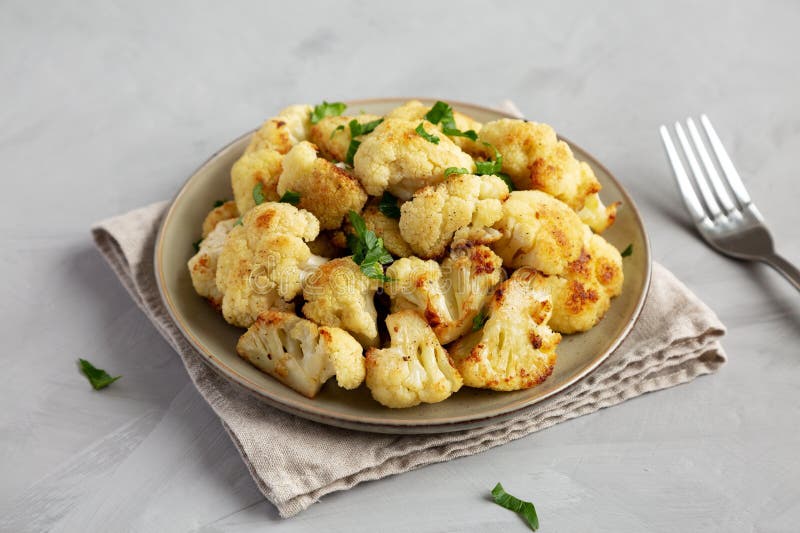 Homemade Roasted White Cauliflower on a Plate, Side View Stock Photo ...