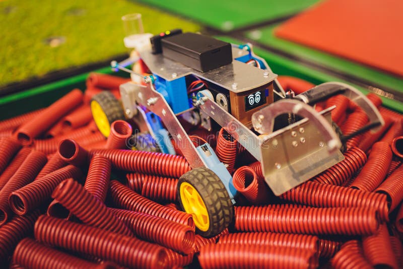 Homemade Robot on Wheels with Eyes. Hobby Robotics. Stock Photo - Image ...