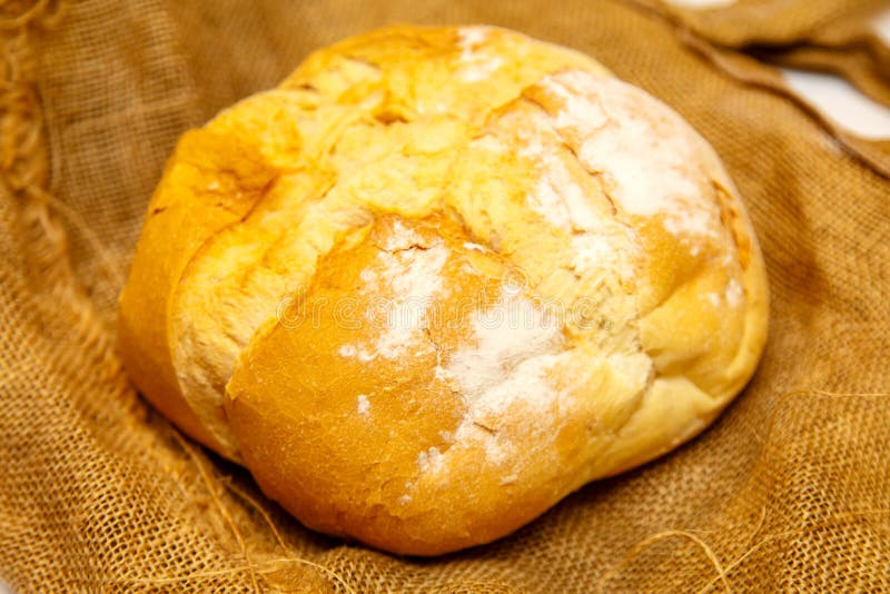 Homemade Round Bread from Wheat Flour Lies on Rough Cloth. Stock Image ...