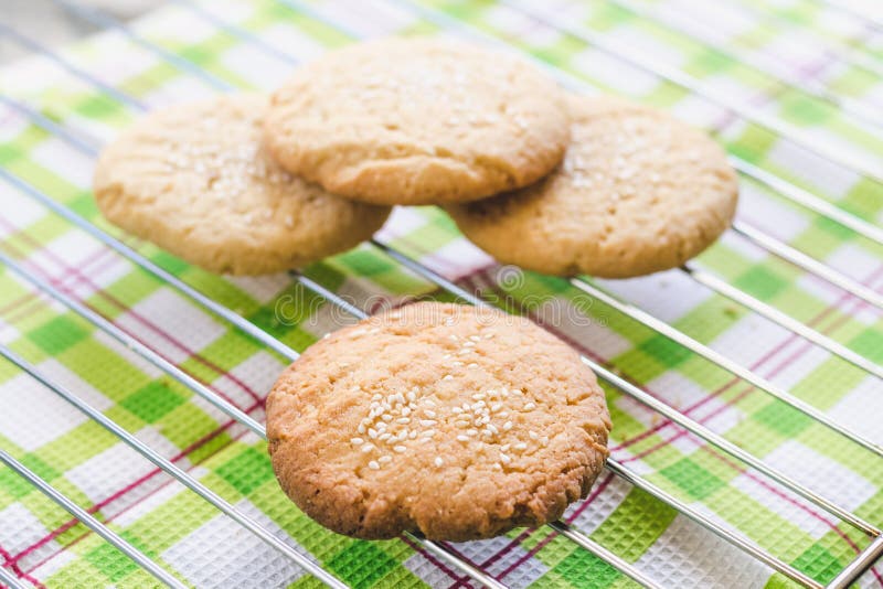 Homemade Round Shortbread Cookies with Sesame Seeds on a Wire Rack ...