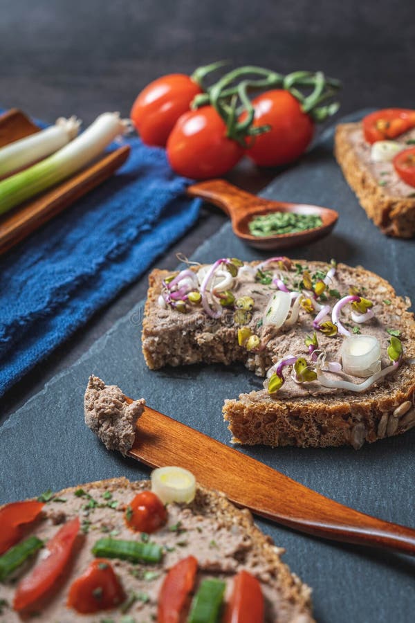 Homemade Rustic Pate on Bitten Slice of Bread with Fresh Vegetables ...