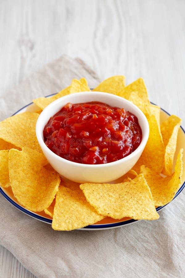 Homemade Salsa and Tortilla Chips on a Plate, Side View Stock Photo ...