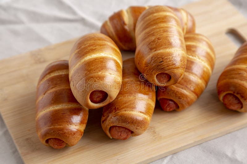 Homemade Sausage Buns on a Bamboo Board, Side View Stock Image - Image ...