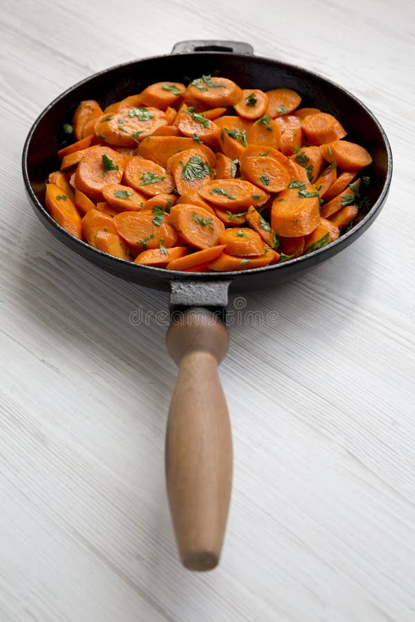 Homemade Sauteed Carrots in a Cast Iron Pan, Side View Stock Image ...