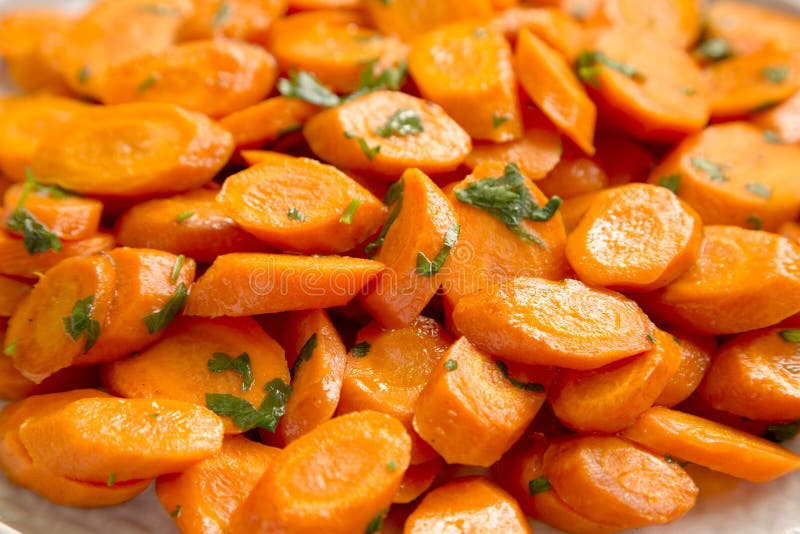 Homemade Sauteed Carrots on a Plate, Side View. Close-up Stock Photo ...