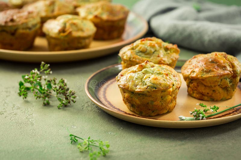 Homemade Savory Muffins with Zucchini and Cheese on Kitchen Table Stock ...