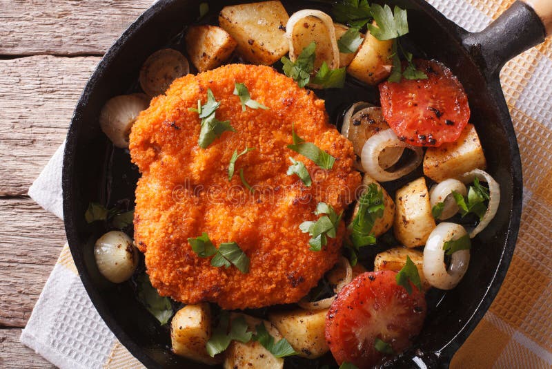 Homemade Schnitzel and Vegetables on Pan Close-up. Horizontal To Stock ...