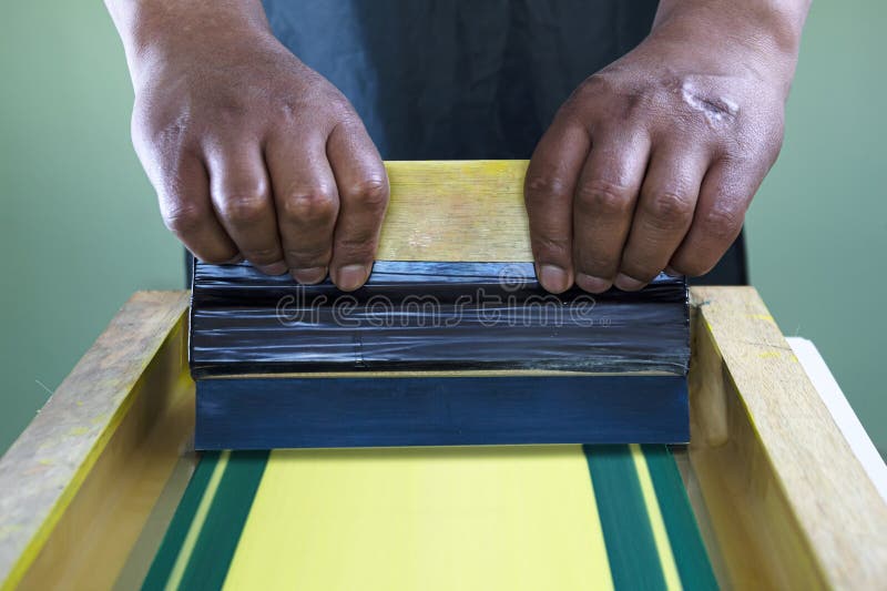 Homemade Screen Printing. Hands Hold a Graphic Printing Squeegee on ...