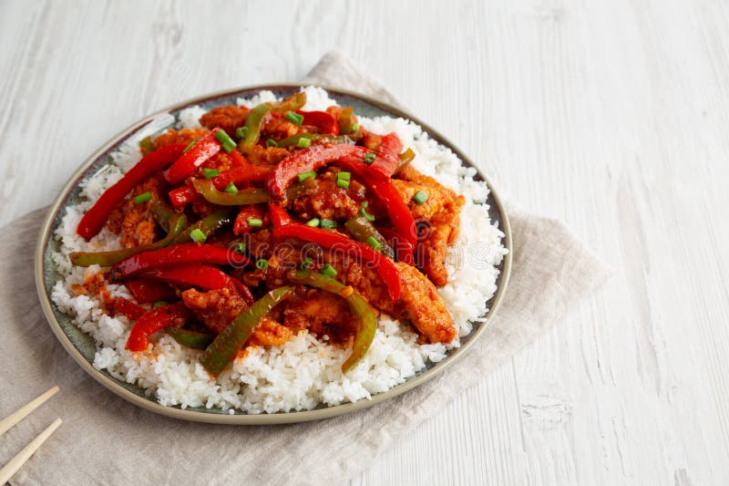 Homemade Simple Chili Chicken with White Rice on a Plate, Side View ...