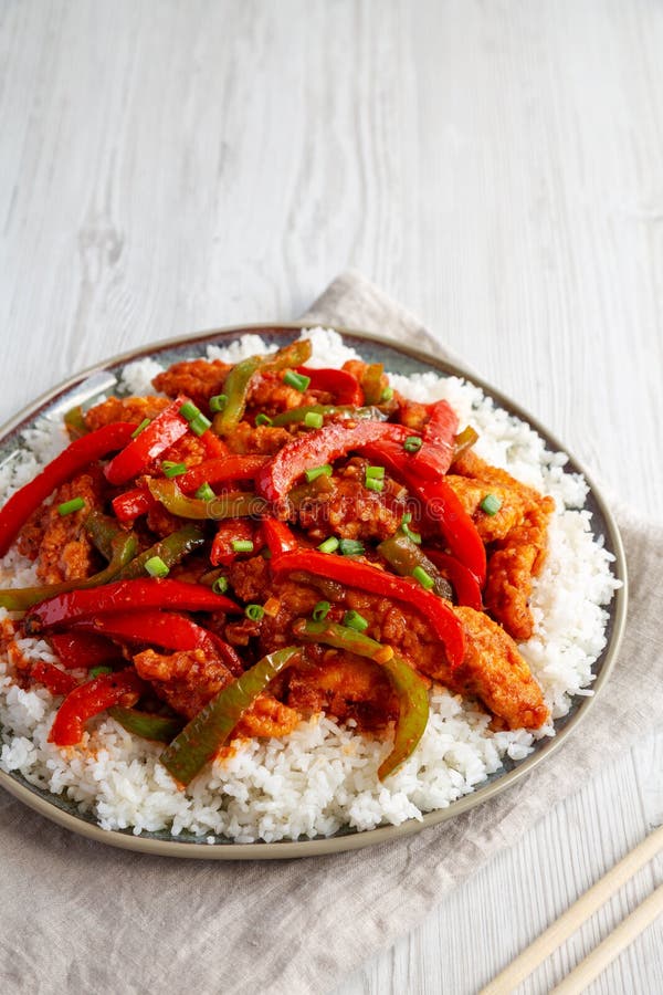 Homemade Simple Chili Chicken with White Rice on a Plate, Side View ...