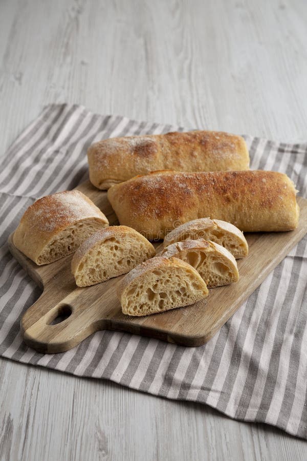 Homemade Sliced Ciabatta Bread on a Wooden Board, Side View Stock Image ...
