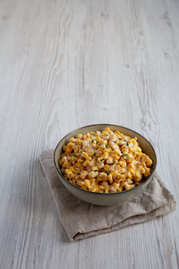 Homemade Slow Cooker Creamed Corn in a Bowl, Side View. Space for Text ...