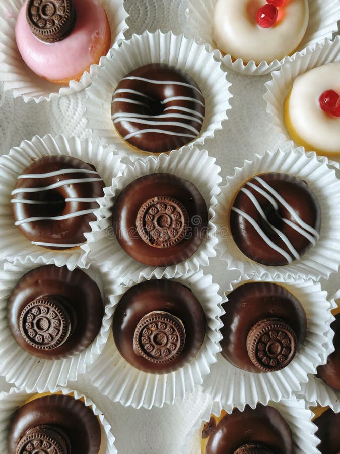 Homemade Small Mini Donuts for Breakfast with Sprinkles and Frosting ...