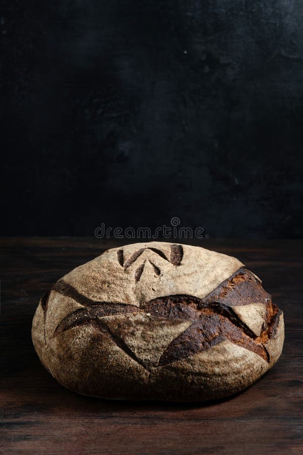 Sourdough Bread on Black Table. Side View Stock Photo - Image of ...