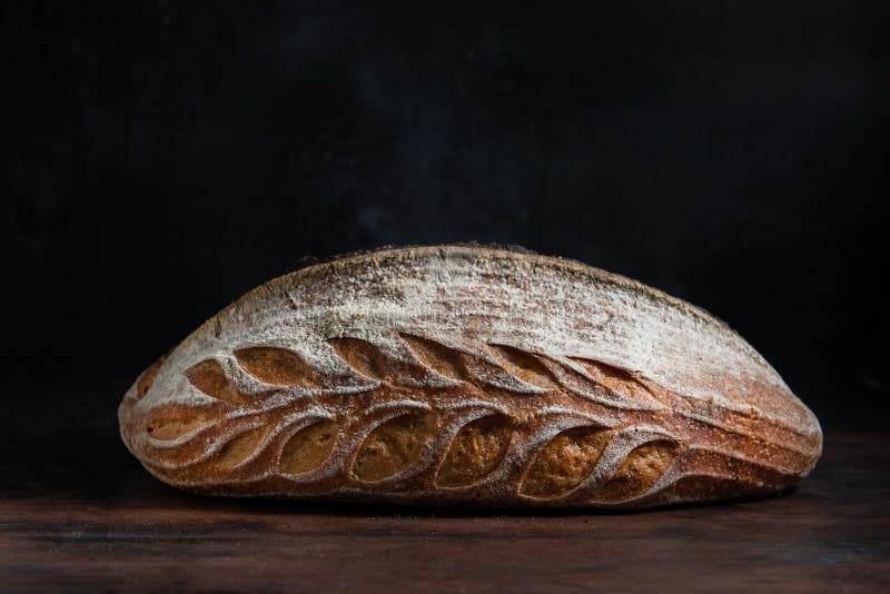 Sourdough Bread on Black Table. Side View Stock Photo - Image of fresh ...