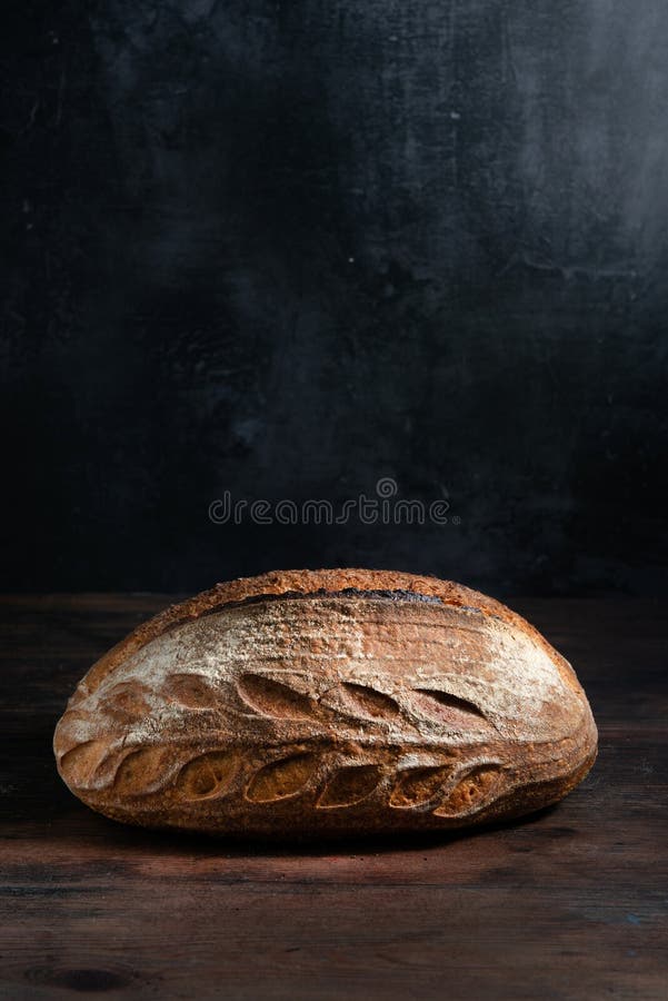 Sourdough Bread on Black Table. Side View Stock Photo - Image of ...