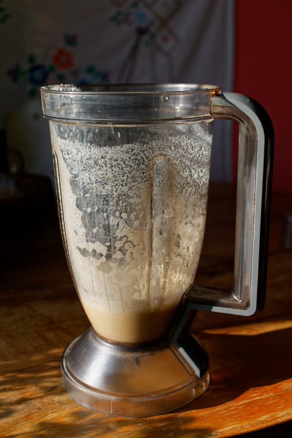 Homemade Soy Milk: Pressing the Milk Out of the Pulp Stock Photo ...