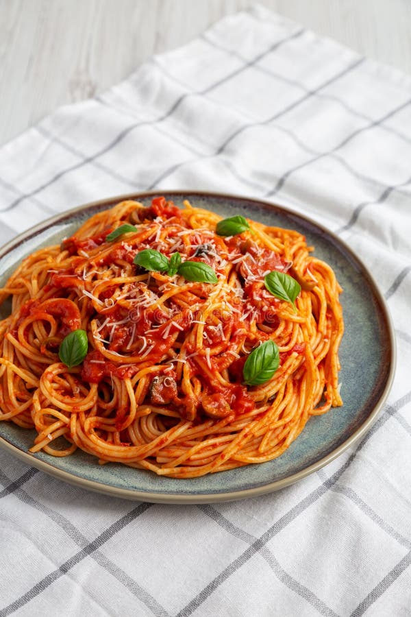 Homemade Spaghetti with Olives and Tomato Sauce, Side View Stock Photo ...