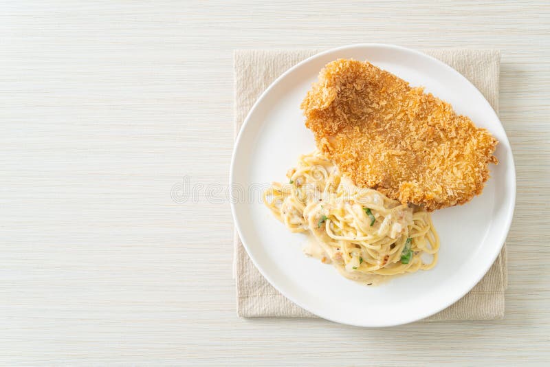 Spaghetti Pasta White Cream Sauce with Fried Fish Stock Photo - Image ...