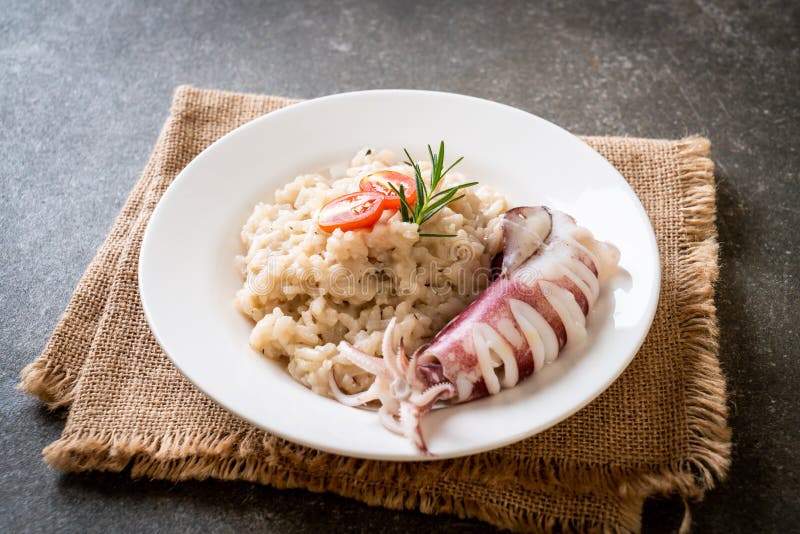 Squids or octopus risotto stock photo. Image of black - 156317762
