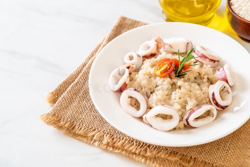 Squids or octopus risotto stock photo. Image of rice - 156534184