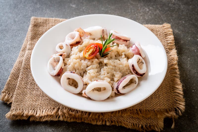 Squids or octopus risotto stock image. Image of diet - 156534189