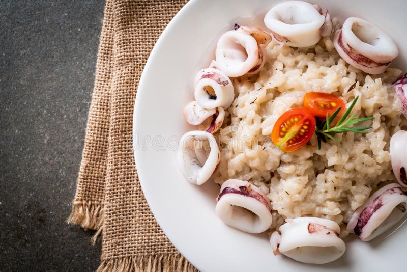 Squids or octopus risotto stock photo. Image of fine - 156537176