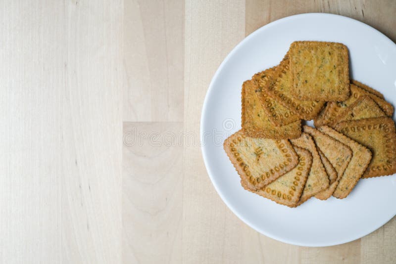 Homemade Thin Crispy Crackers on White Plate. Stock Image - Image of ...