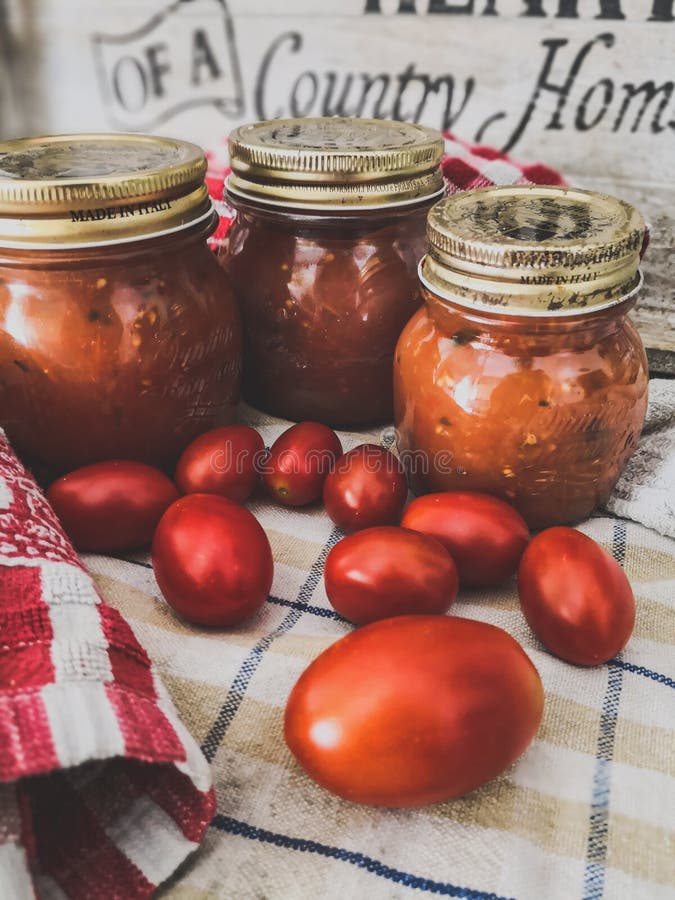 Tomato jars stock photo. Image of jars, homemade, tomato - 127688618