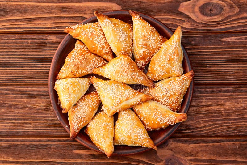 Homemade Triangle Puff Pastry with Meat on Rustic Background . Samosa ...