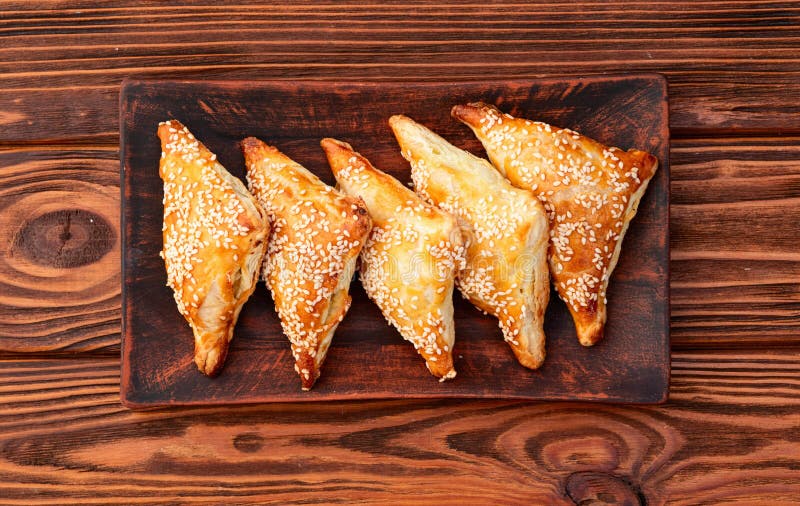 Homemade Triangle Puff Pastry with Meat on Rustic Background . Samosa ...