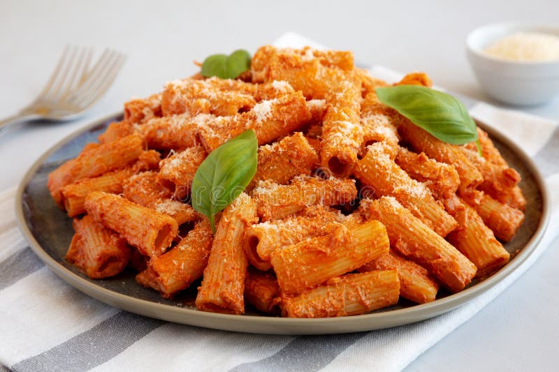 Homemade Vodka Rigatoni Pasta with Parmesan and Basil, Side View Stock ...