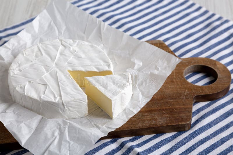 Homemade White Brie Cheese on a Wooden Board, Side View Stock Photo ...