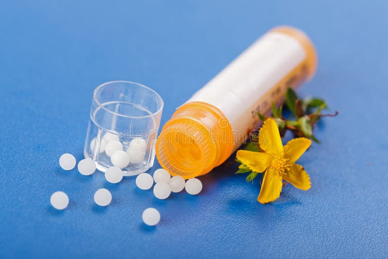 Homeopathic Pills and Hypericum Stock Photo - Image of blue, container ...