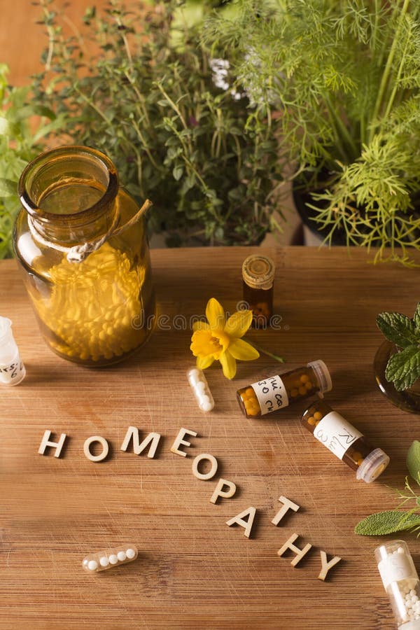 Homeopathy Globules and Bottles Stock Image - Image of yellow, remedy ...