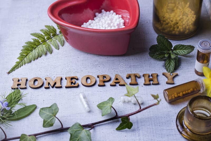 Homeopathy Globules and Bottles Stock Photo - Image of macro, liquid ...