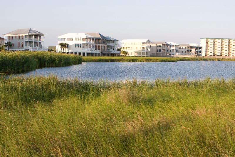 Homes Encroach on Wetlands stock photo. Image of protected - 9784224